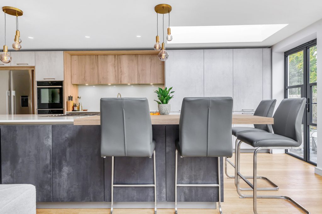 A Modern & Welcoming Kitchen Design with Hidden Utility