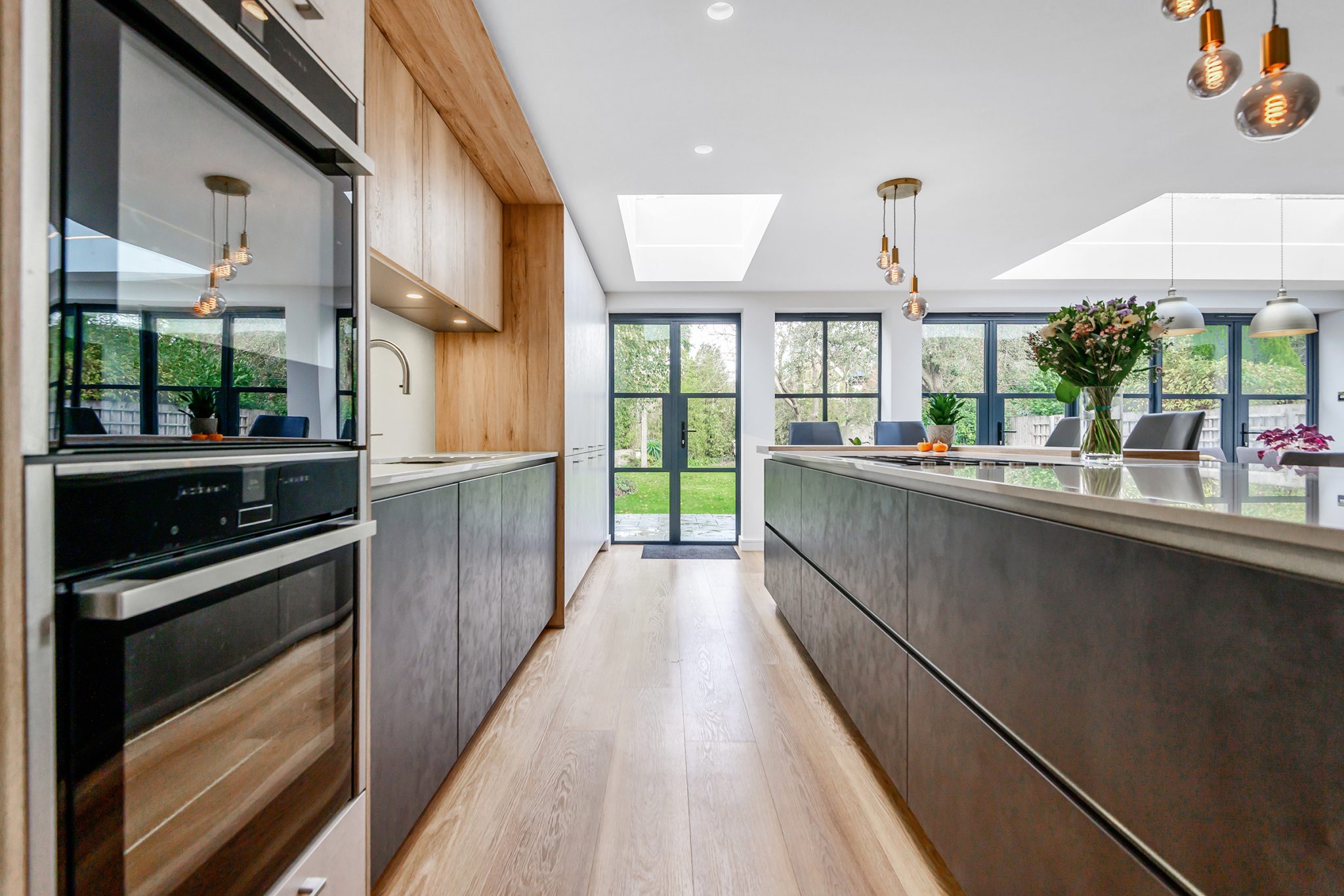 A Modern & Welcoming Kitchen Design with Hidden Utility